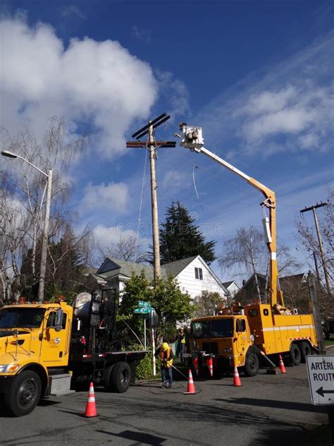 Seattle City Light Workmen Replace An Aging Utility Pole Editorial