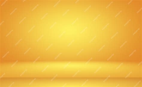 추상 럭셔리 골드 노란색 그라데이션 스튜디오 벽은 배경 레이아웃 배너 및 제품 프레젠테이션으로 잘 사용됩니다 무료 사진