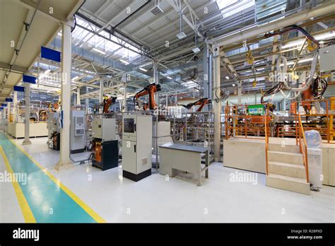 Process Of Welding Cars Modern Assembly Of Cars At Plant Automated