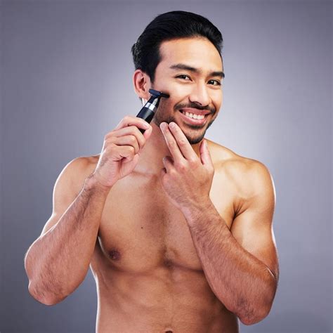 Premium Photo Beard Hair Trimmer Portrait Or Happy Man With Bathroom