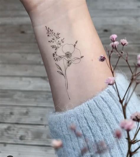 Pin By Kat Camus On Tatted Uppp Flower Wrist Tattoos Subtle Tattoos