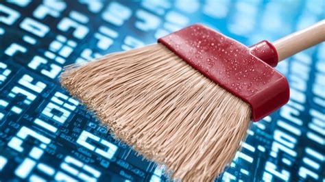Data Deletion Or Clearing Is Represented By Blue Binary Code Being Swept Away With A Broom