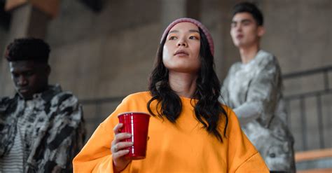 Woman In Yellow Long Sleeve Shirt Holding Red Plastic Cup · Free Stock