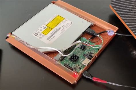 Custom Slimline Cd Player Hides Out Under Speaker Hackaday