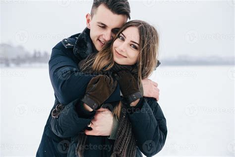Guy Hugging His Girlfriend From Behind 11371035 Stock Photo At Vecteezy