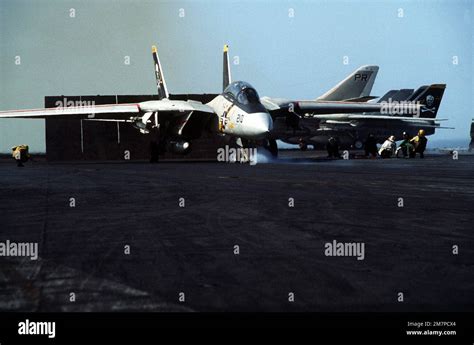 An F 14 Tomcat Aircraft Is In Position For Takeoff From The Port Catapult Of The Aircraft