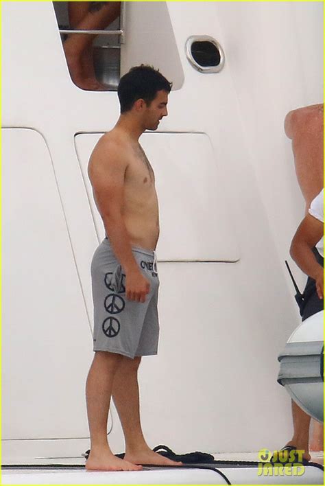 Full Sized Photo Of Joe Jonas Shirtless Farmers Tan Cannes Photo Just Jared