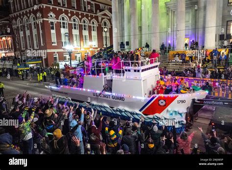 Paradegoers Are Seen During The Krewe Of Orpheus Mardi Gras Parade In