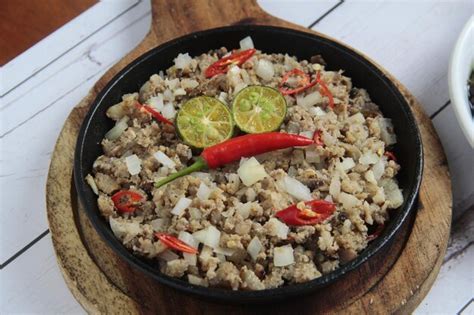 Premium Photo Photo Of Freshly Cooked Filipino Food Called Pork Sisig