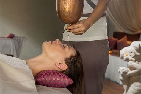 Shirodhara An Ayurvedic Healing Technique Oil Dripping On The Female