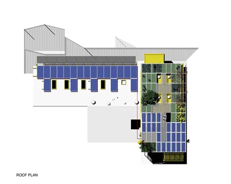 Ecotech Gives A 1950s Bungalow A Bright Yellow Shipping Container Addition