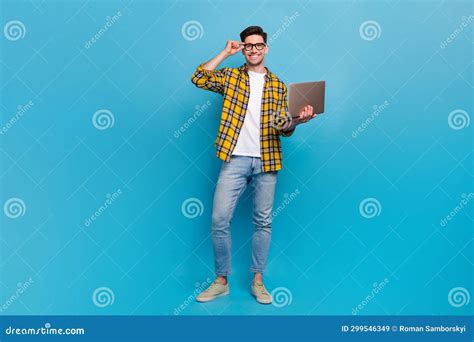 Full Size Body Photo Of Smart Young Guy Programmer Touch Eyeglasses Hold Netbook Fixing Bugs In