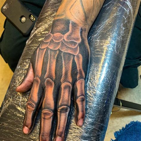 101 Amazing Skeleton Hand Tattoo Ideas That Will Blow Your Mind Bone