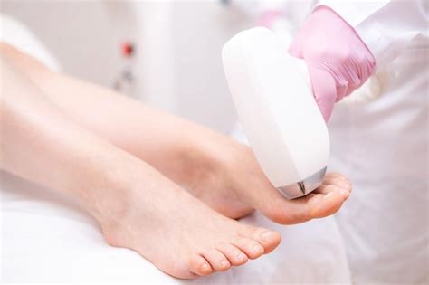 Premium Photo Diode Laser Hair Removal Beautician Removes Hair On