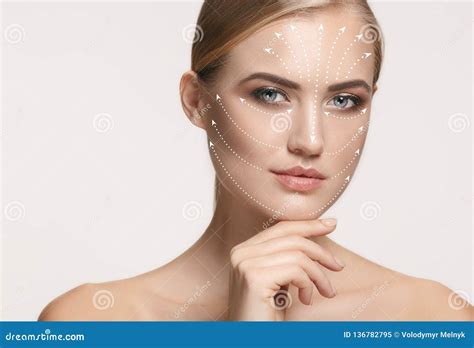 Close Up Portrait Of Young Beautiful And Healthy Woman With Arrows On