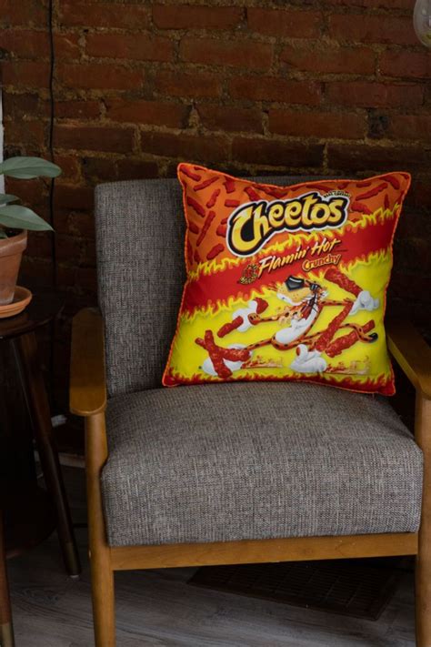 Upgrade Your Bedroom With A Flamin Hot Cheetos Pillow