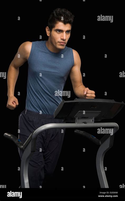 Man Running On A Treadmill Stock Photo Alamy