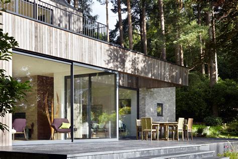 Alma Nac Slots Angular Openings Into Timber Clad Gables Of House In The