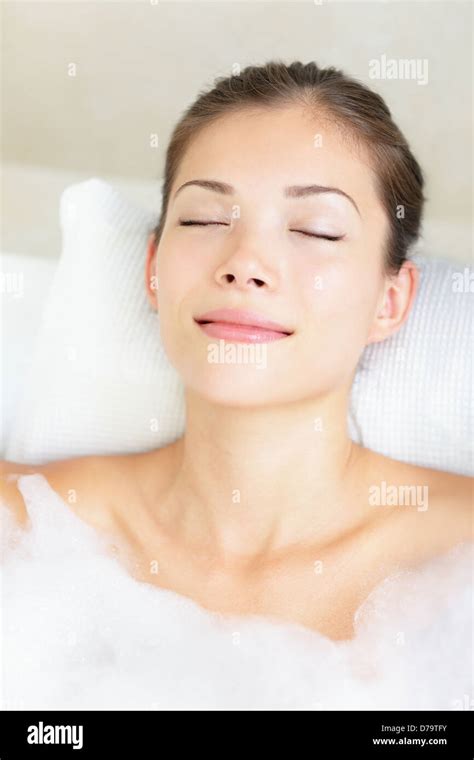 Woman In Bath Relaxing Closeup Of Young Asian Woman In Bathtub Bathing