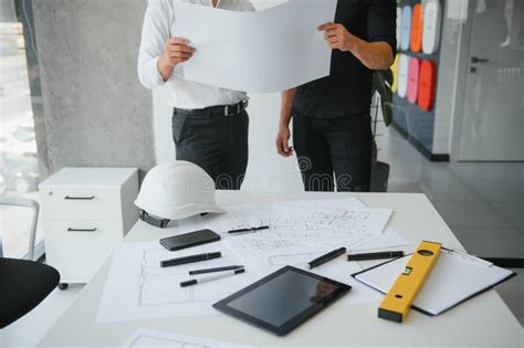 Engineer Or Architect Teamwork Working On Construction Project With