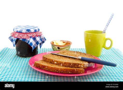 Breakfast With Healthy Brown Bread Butter And Preserved Jam Stock Photo Alamy