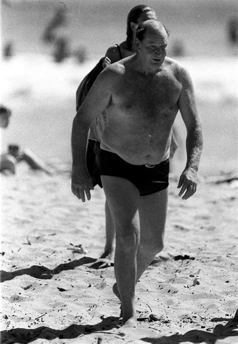 Kerry Packer Emerges From A Dip In The Ocean At Palm Beach