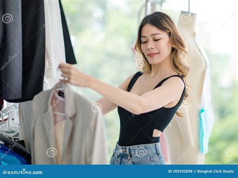 Millennial Asian Young Beautiful Female Customer In Casual Tank Top And