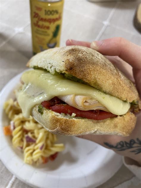 Turkey Provolone And Pesto Sandwich With Fire Roasted Red Peppers