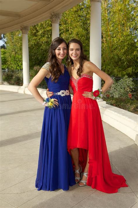 A Group Of Teenage Girls Posing In Their Prom Dresses Stock Image