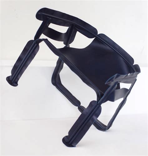 Christian Heikoops Leather Glissade Chair Is Erected From Metal Rods