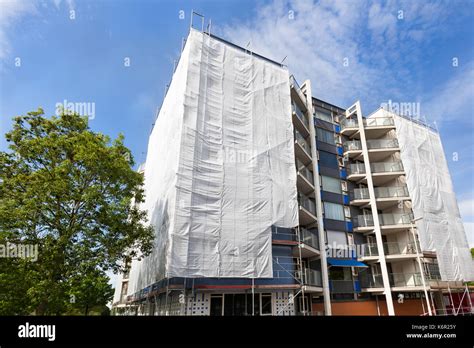 Scaffolding With Safety Nets During Renovation Of An Apartment Stock Photo Alamy