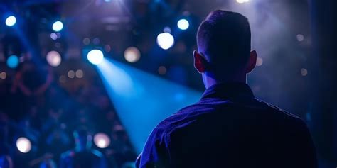 Premium Photo Solo Performer Under Spotlight In A Vibrant Club Atmosphere