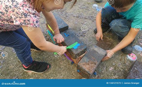 A Brother And Sister Playing With Bricks Editorial Photography Image