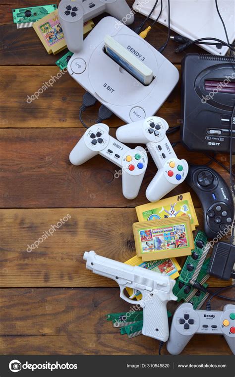 Old 8 Bit Video Game Console And Many Gaming Accessories Like A Joysticks And Cartridges — Stock