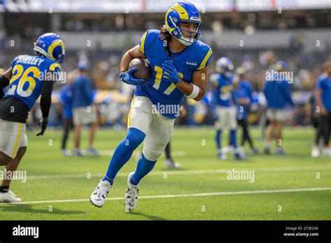 Los Angeles Rams Wide Receiver Puka Nacua Runs With The Ball Before An NFL Football Game