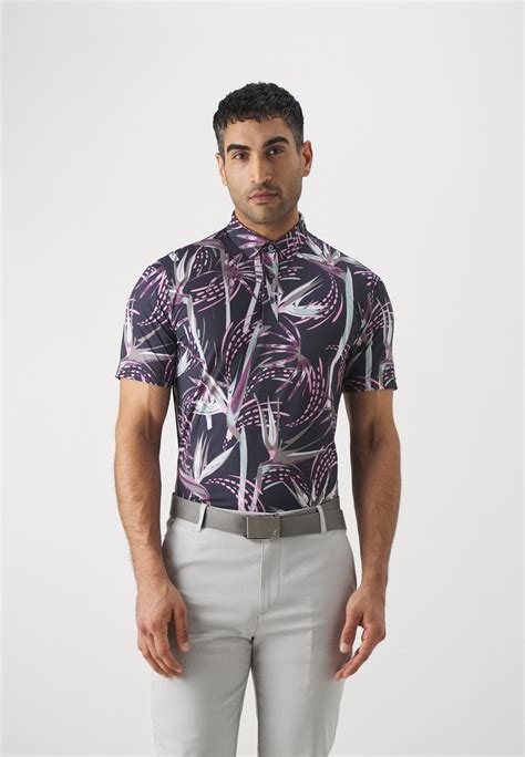 Puma Golf Mattr Birds Of Paradise Polo Shirt Deep Navycrushed Berrydark Blue Uk