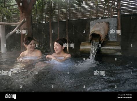 Two Women Soaking In Hot Tub Stock Photo Alamy