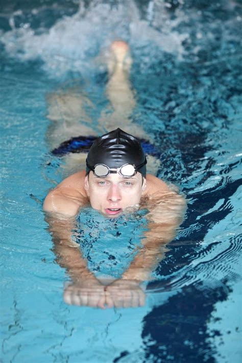 Caucasian Man Practicing Flutter Kick With Kick Board Stock Image Image Of Diver Health 67656863