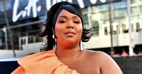 Lizzo Wore Fendi Tiny Bag With Patchwork Flare Jeans