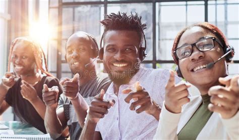 African American Team Working At Call Center Office To Help People With