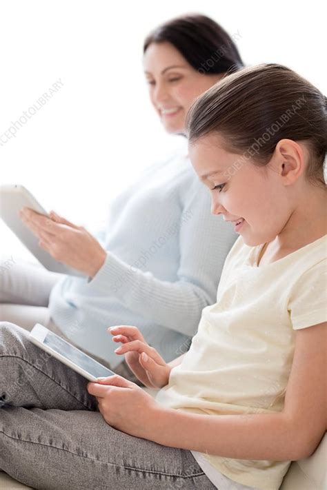 Mother And Daughter With Tablets Stock Image F019 4029 Science