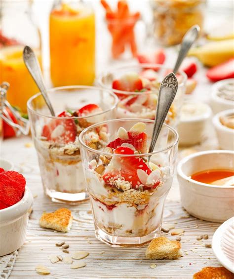 Natural Yogurt With Fresh Fresh Strawberries Granola Honey Nuts And