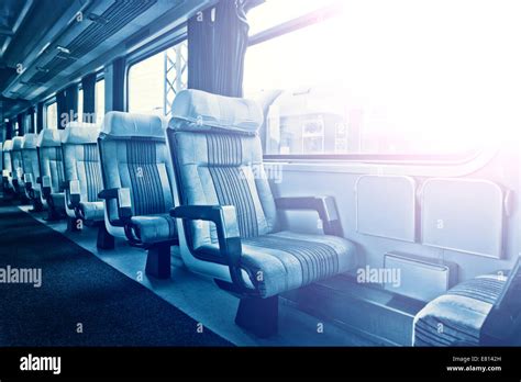 Interior Of European Economy Class Passenger Train With Empty Seats