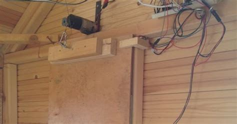 A Raspberry PI Controlled DIY Coop Door