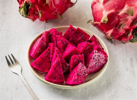 Premium Photo Freshly Sliced Red Dragon Fruit With Raw Fruits Cut