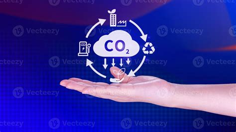 Hand Holding Co2 Reducing Virtual Icon For Decrease Carbon Dioxide