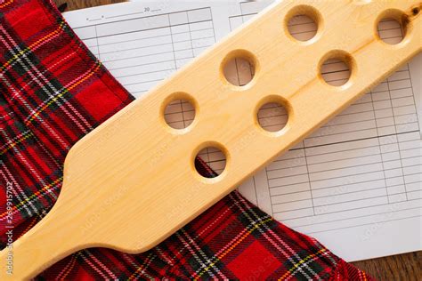 Wooden Paddle And Red School Mini Skirt Schoolgirl Spanking Concept
