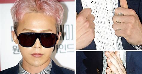 포토엔 지드래곤 깨알같은 손 문신 어디어디 숨었나