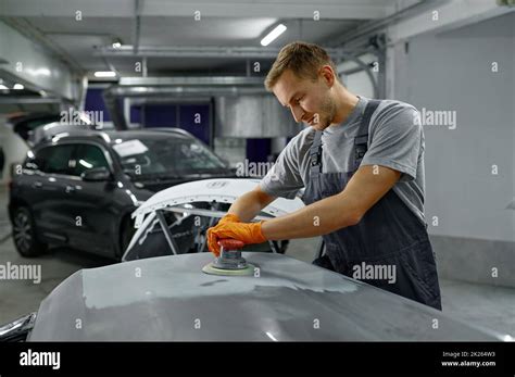 Repairman With Sander Removing Old Paint Car Stock Photo Alamy
