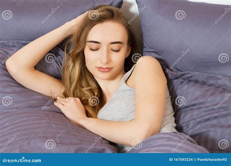 Beautiful Girl Sleeps In The Bedroom Sleepinf Woman In Bed Close Up